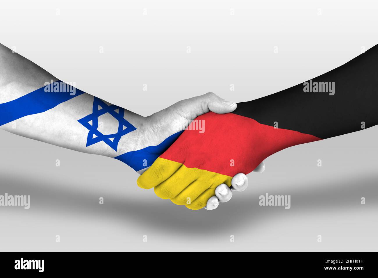 Handshake between finland and israel flags painted on hands ...