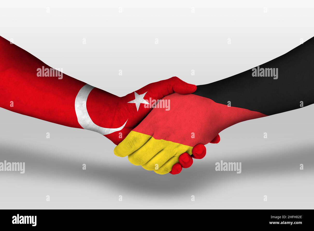 Handshake between finland and turkey flags painted on hands ...