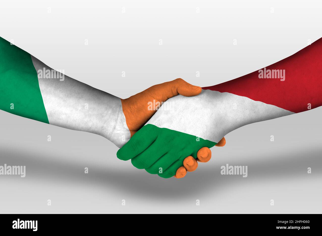 Handshake between germany and ireland flags painted on hands ...