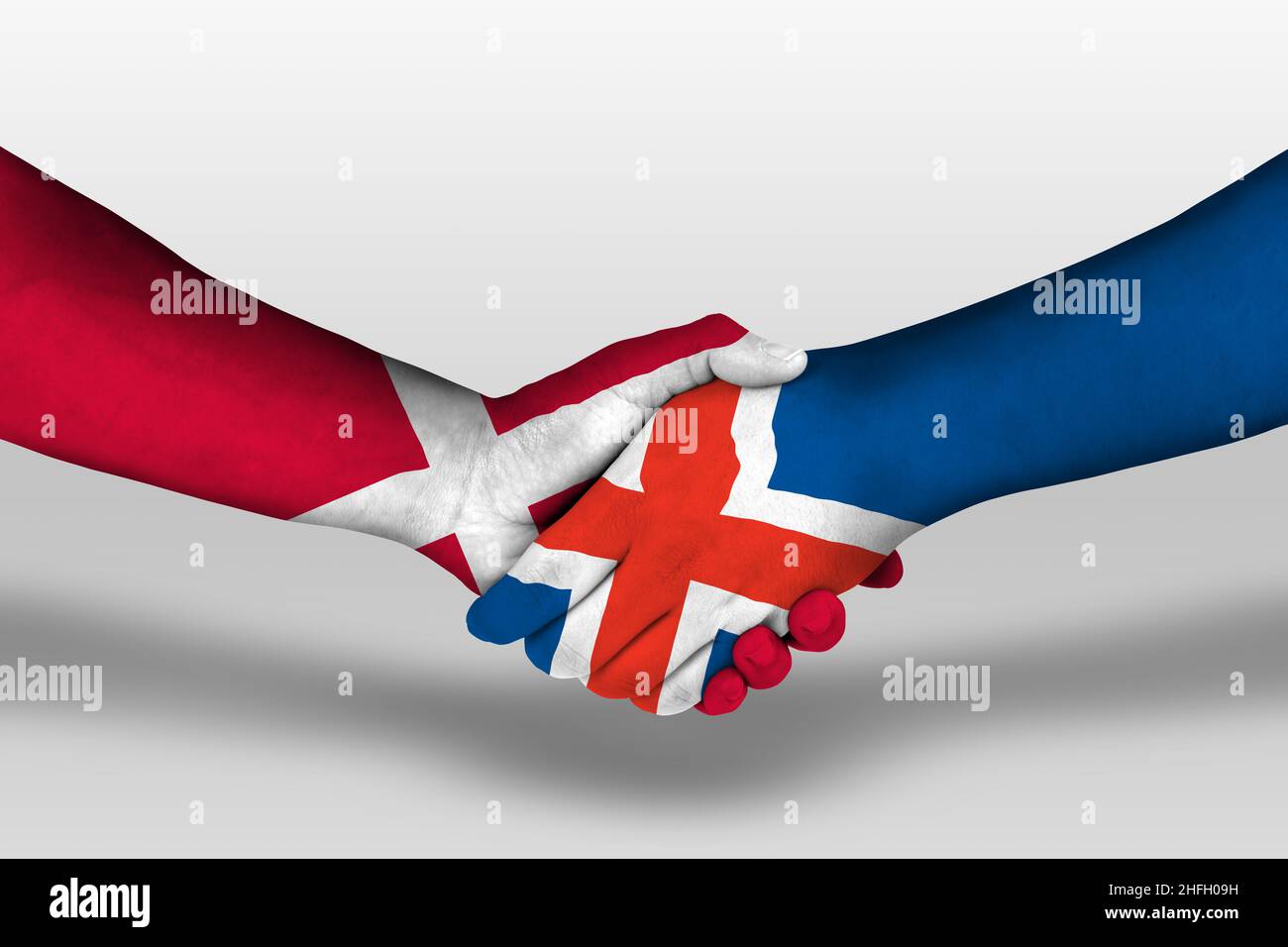 Handshake between hong kong and denmark flags painted on hands ...