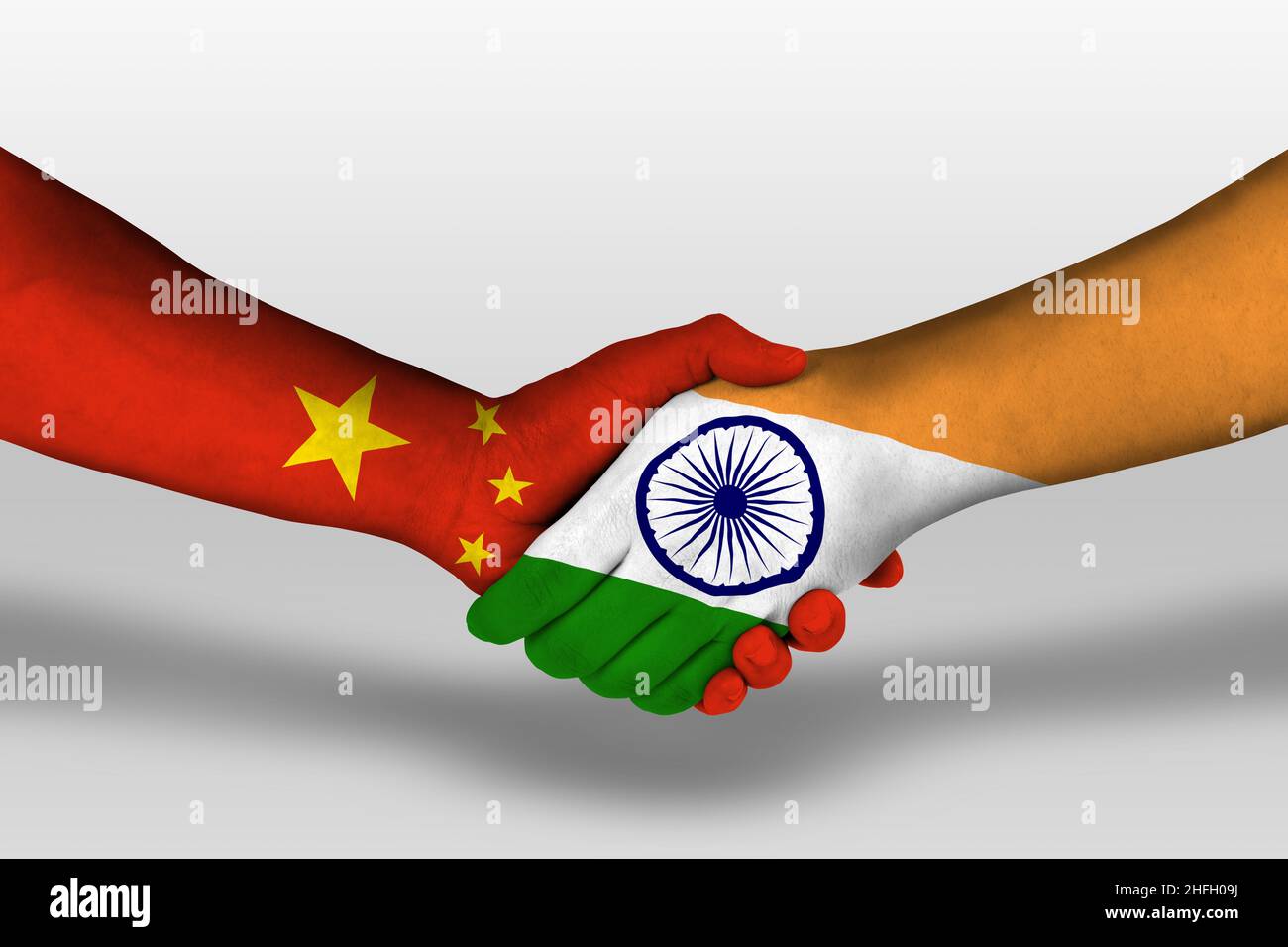 Handshake between hong kong and china flags painted on hands ...