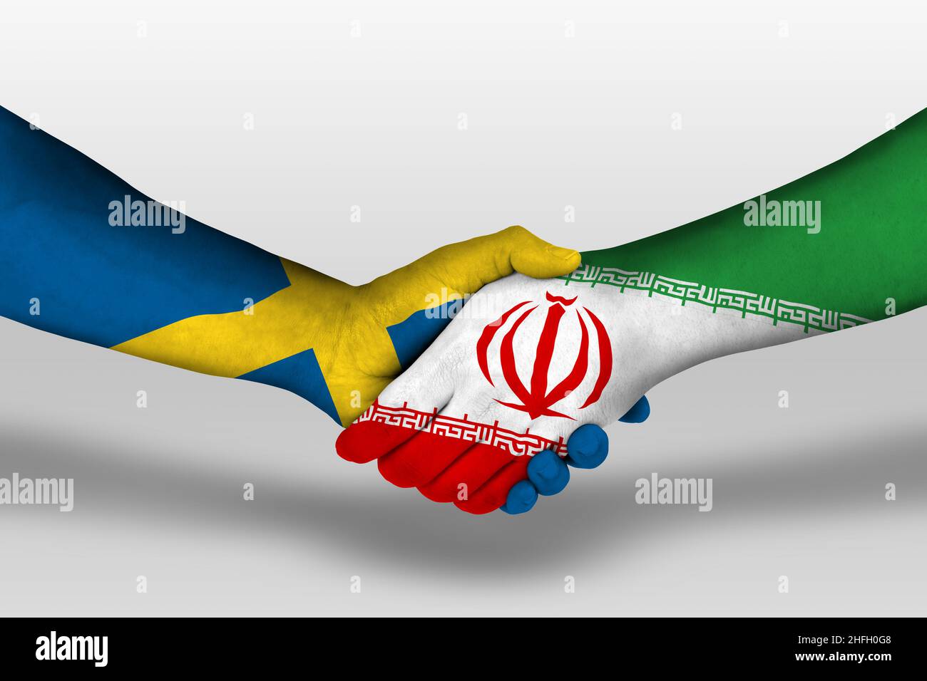 Handshake between iceland and sweden flags painted on hands ...