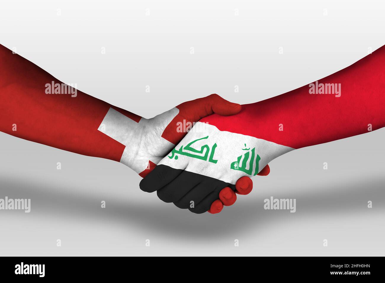 Handshake between india and switzerland flags painted on hands ...