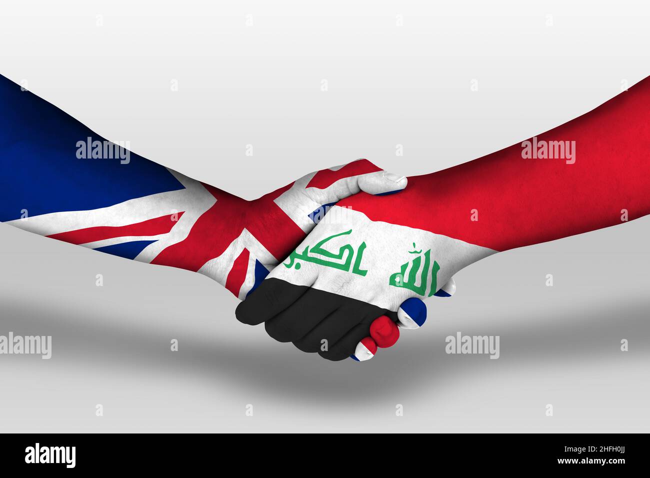 Handshake between india and united kingdom flags painted on hands ...