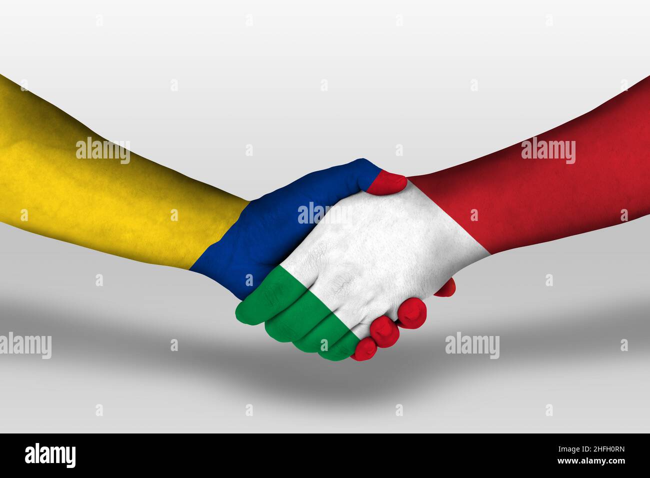 Handshake between ireland and columbia flags painted on hands ...