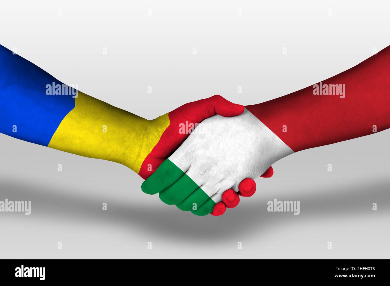 Handshake between ireland and romania flags painted on hands ...