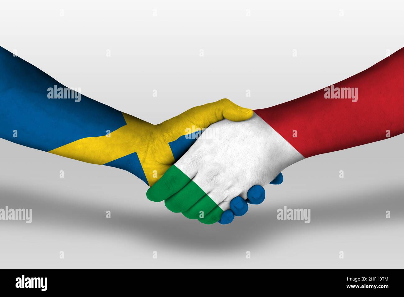 Handshake between ireland and sweden flags painted on hands ...