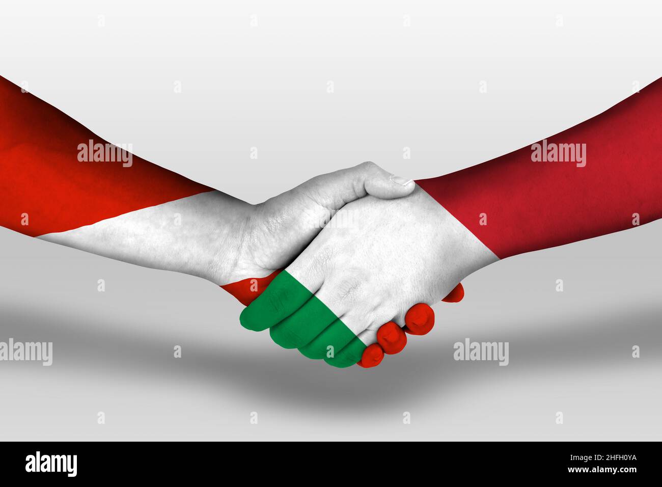 Handshake between italy and austria flags painted on hands ...