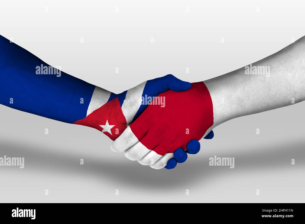 Handshake between japan and cuba flags painted on hands, illustration ...