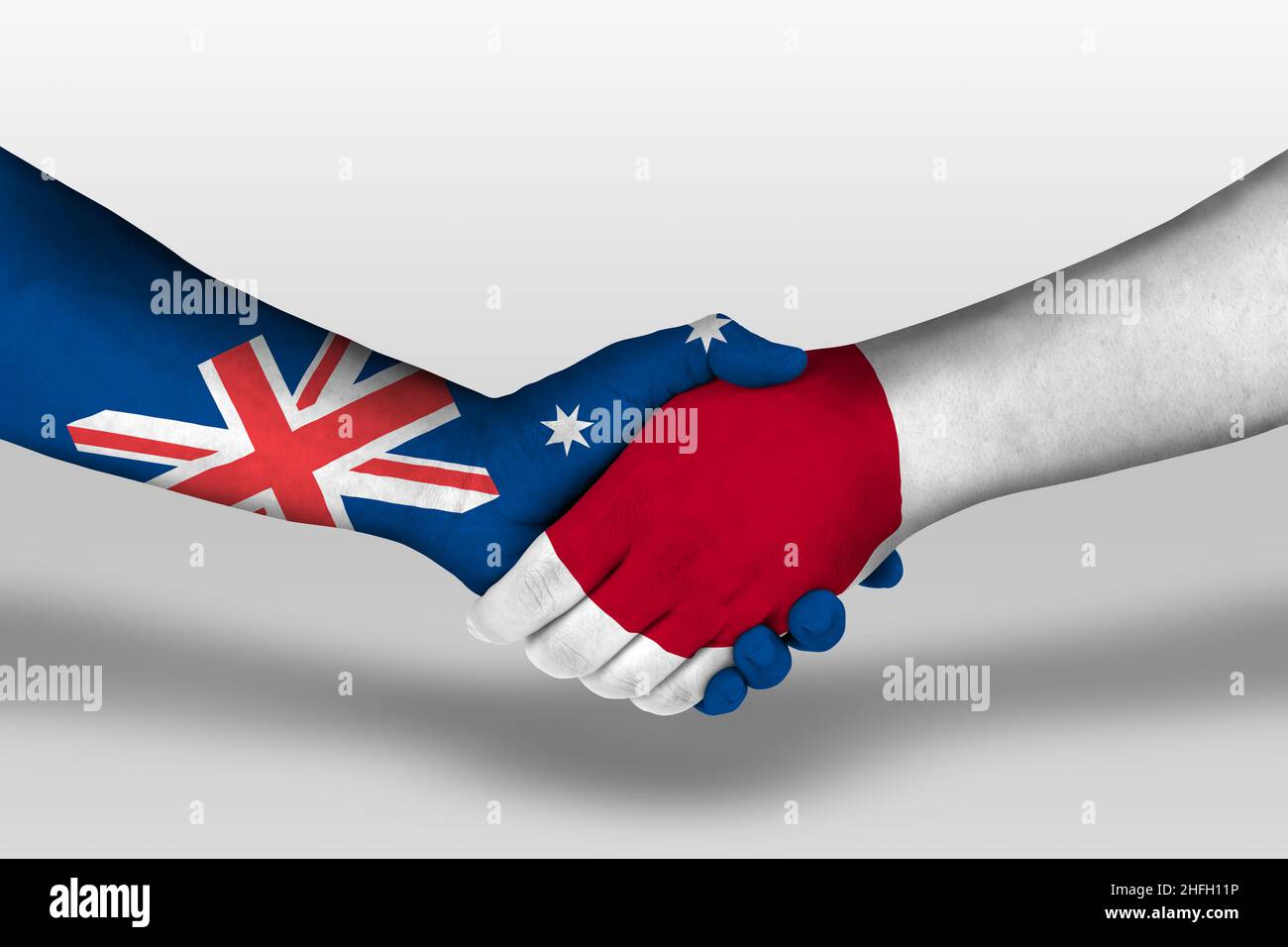 Handshake between japan and australia flags painted on hands ...