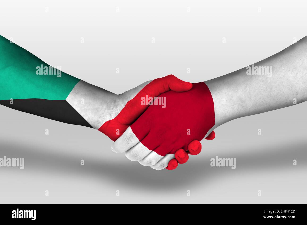 Handshake between japan and kuwait flags painted on hands, illustration ...