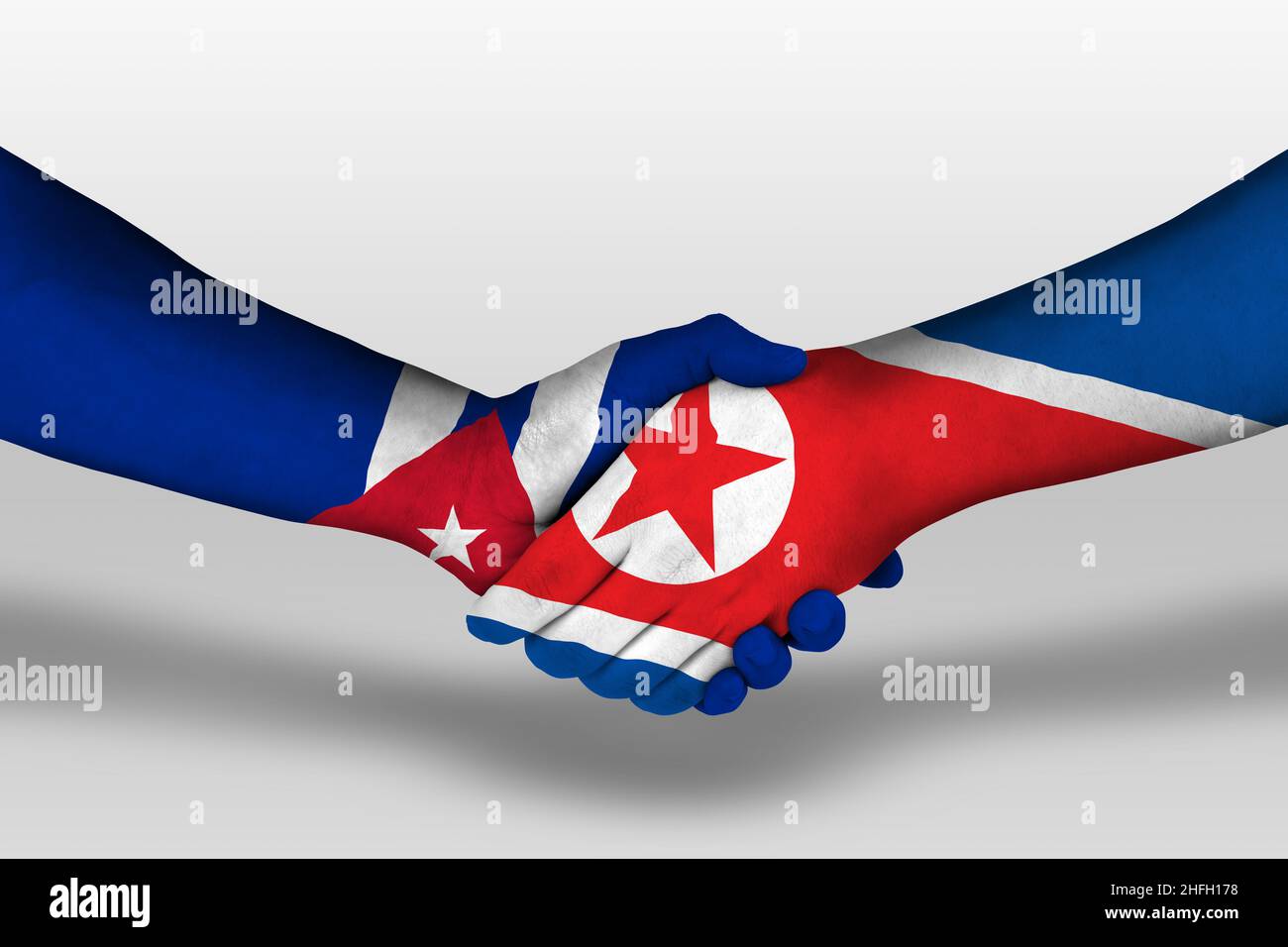 Handshake between north korea and cuba flags painted on hands ...