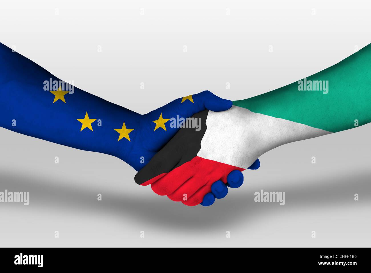 Handshake between kuwait and european union flags painted on hands ...