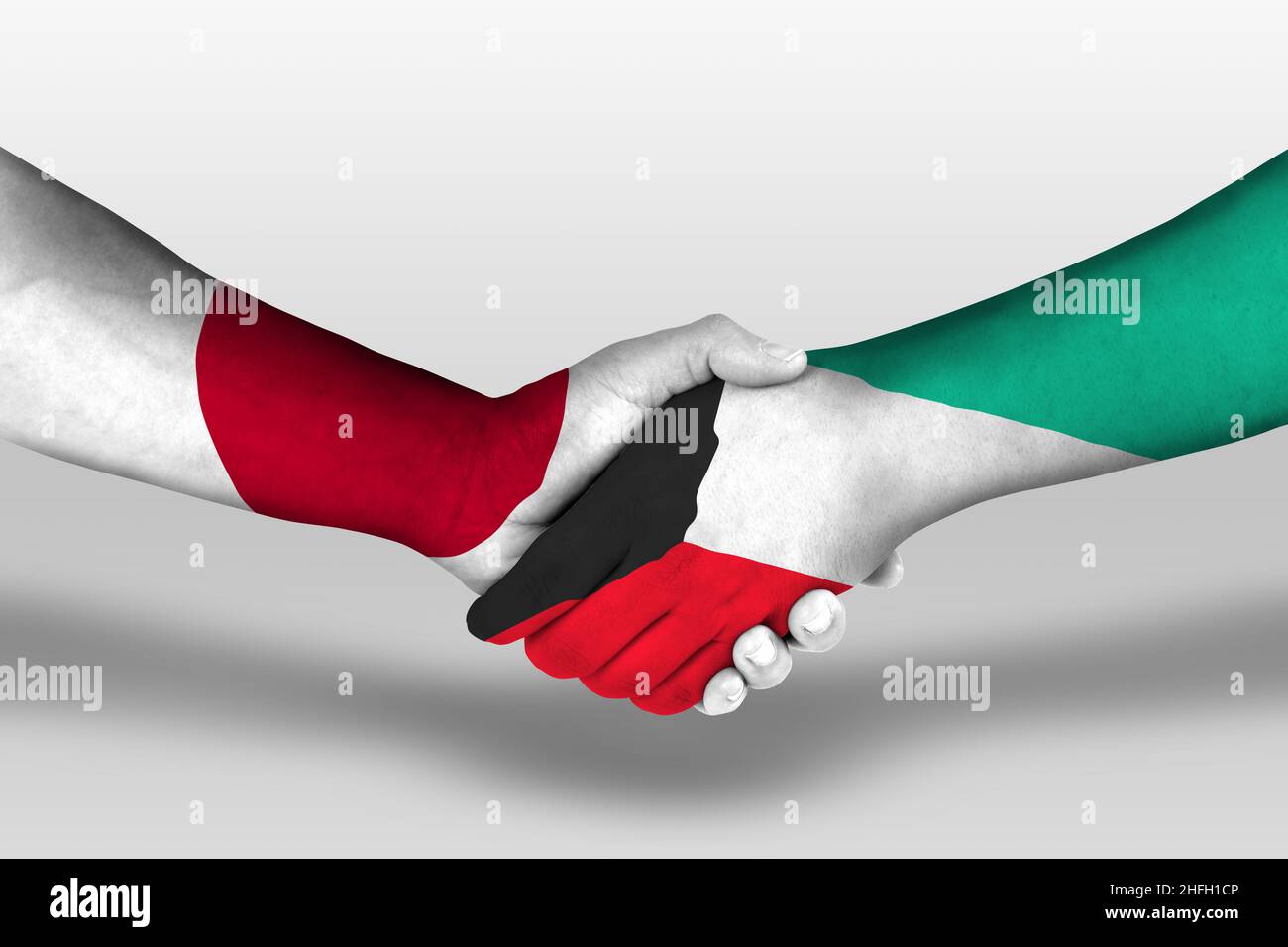 Handshake between kuwait and japan flags painted on hands, illustration ...