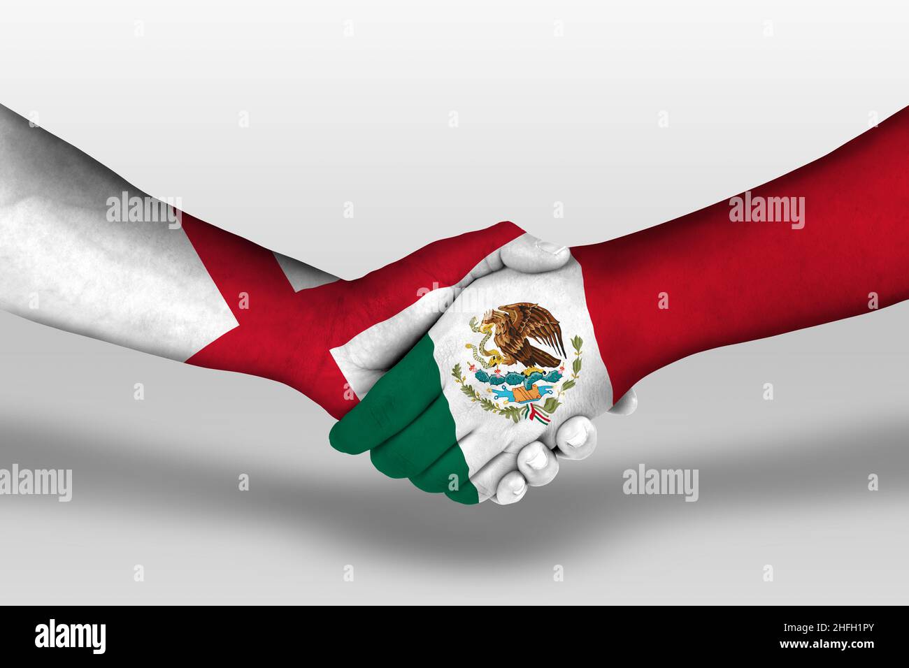 Handshake between mexico and england flags painted on hands ...