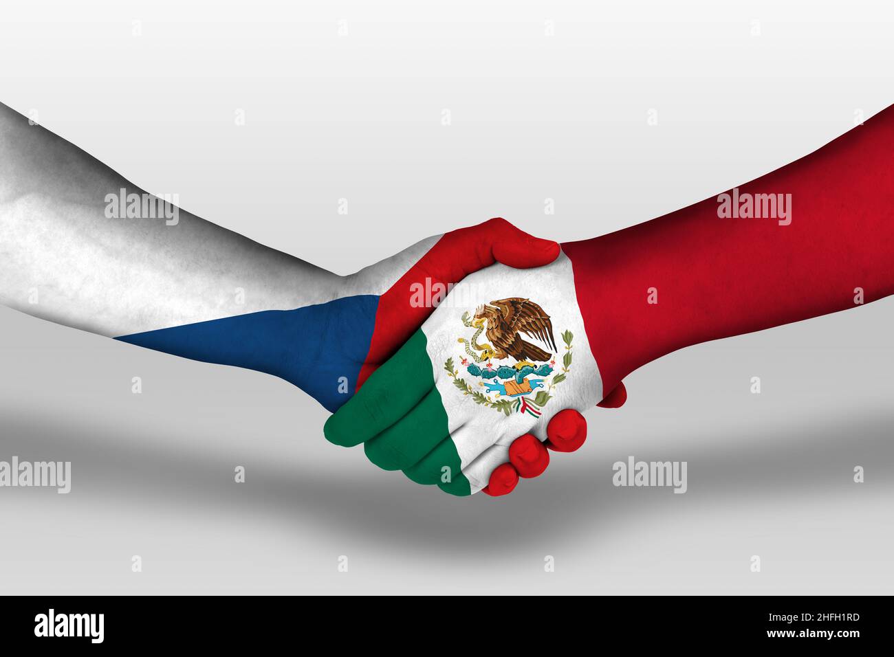 Handshake between mexico and czech republic flags painted on hands ...
