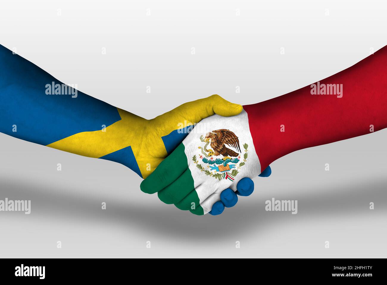 Handshake between mexico and sweden flags painted on hands ...