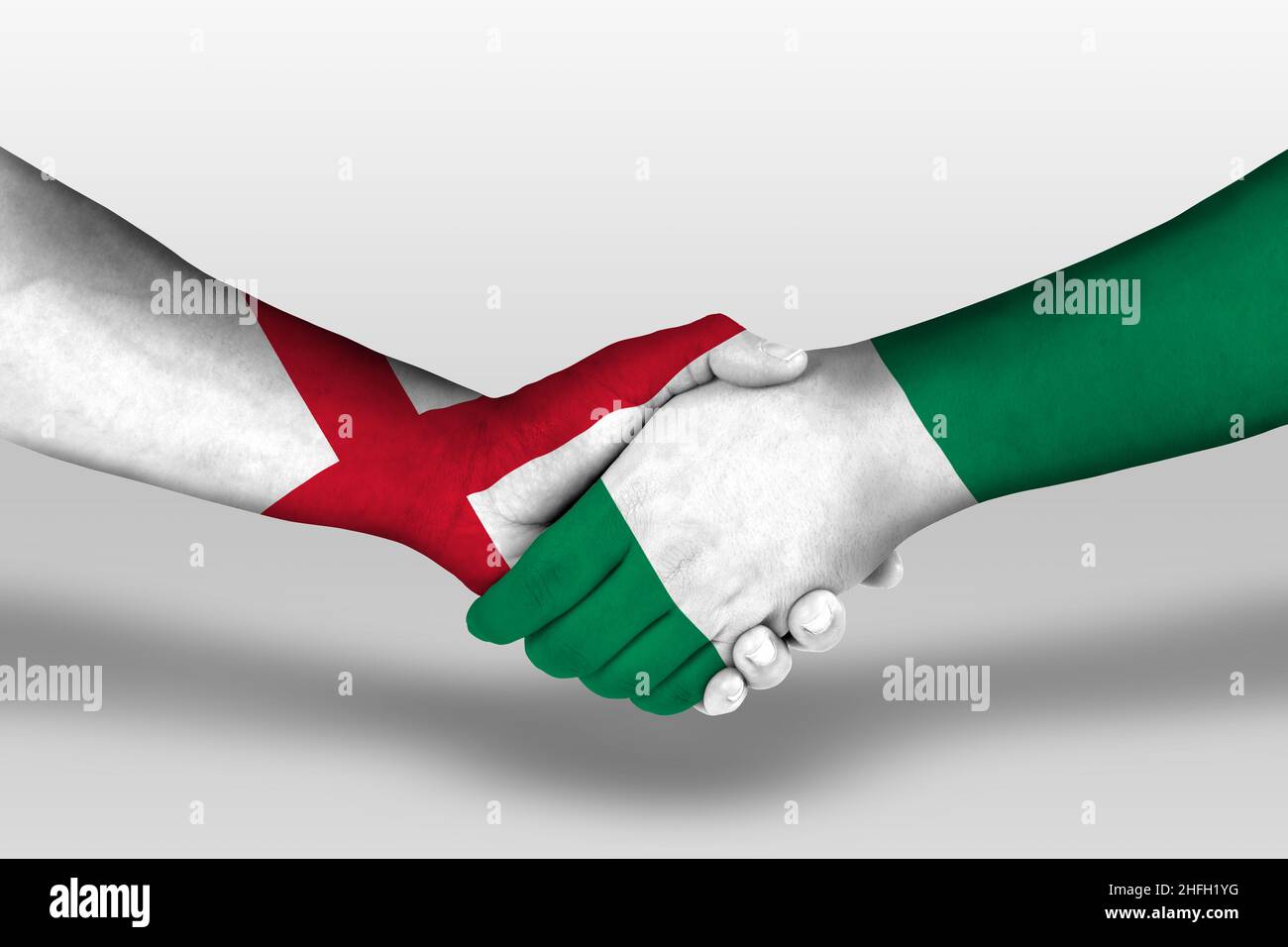 Handshake between nigeria and england flags painted on hands ...