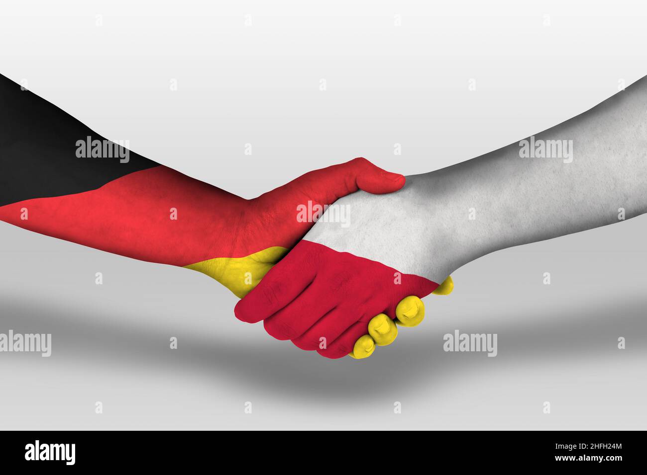 Handshake between poland and germany flags painted on hands ...