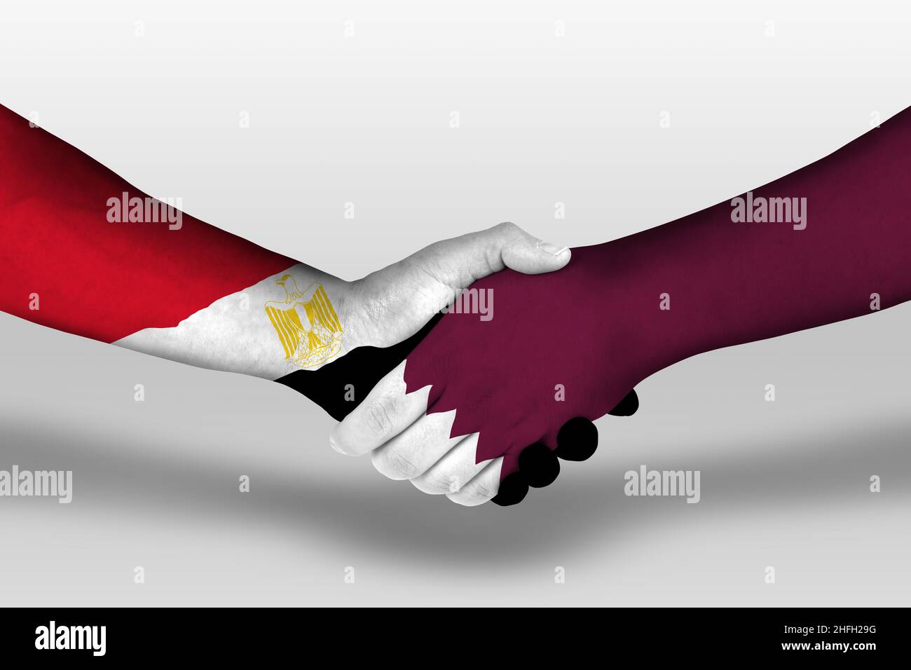 Handshake between qatar and egypt flags painted on hands, illustration ...