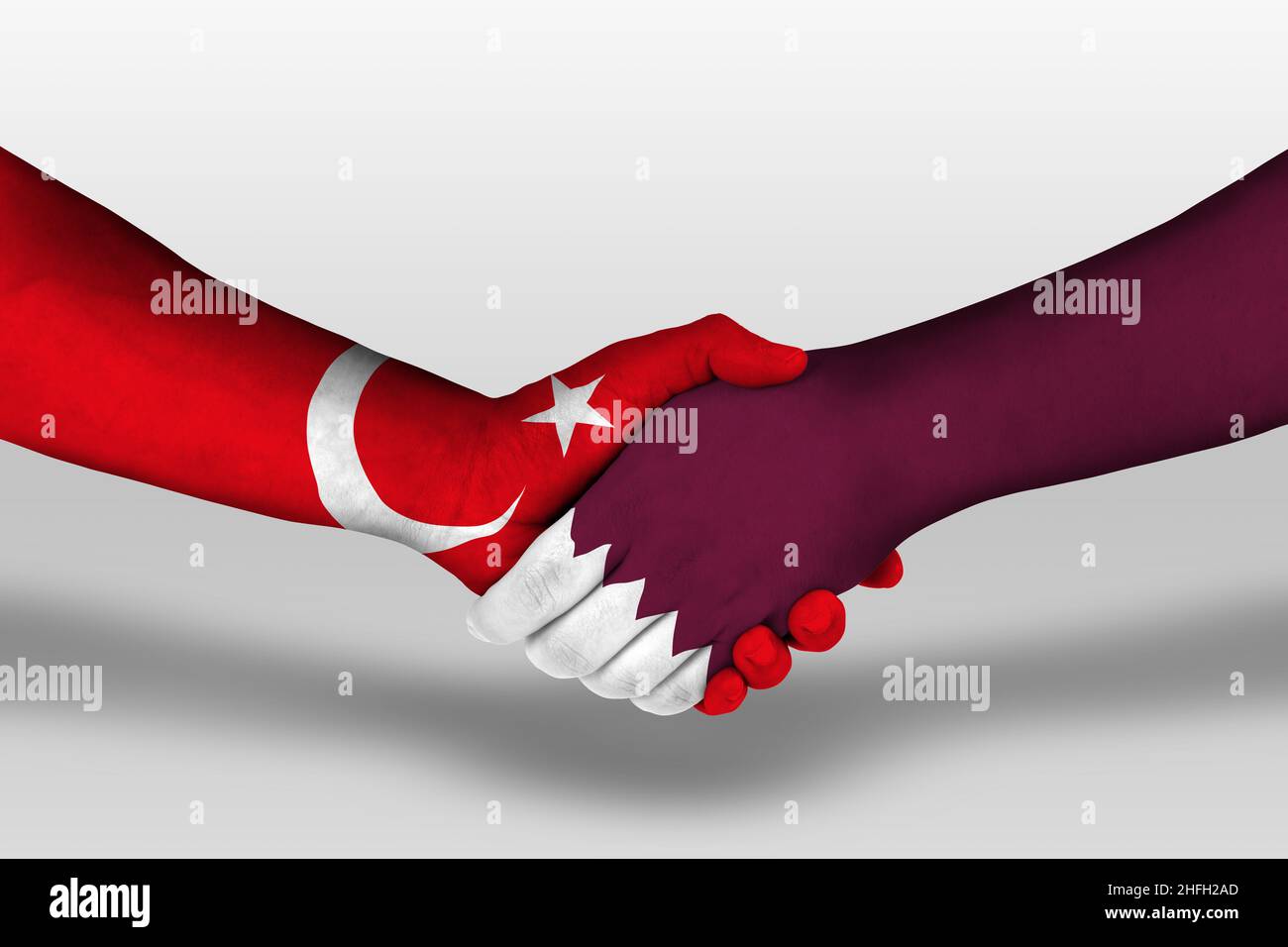 Handshake between qatar and turkey flags painted on hands, illustration ...