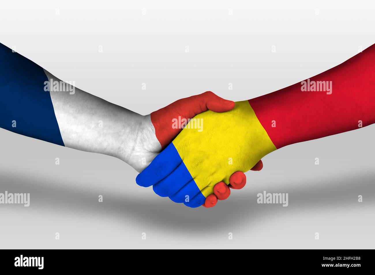 Handshake between romania and france flags painted on hands ...