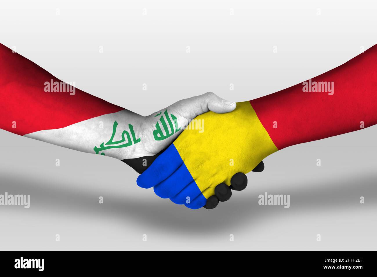 Handshake between romania and iraq flags painted on hands, illustration ...