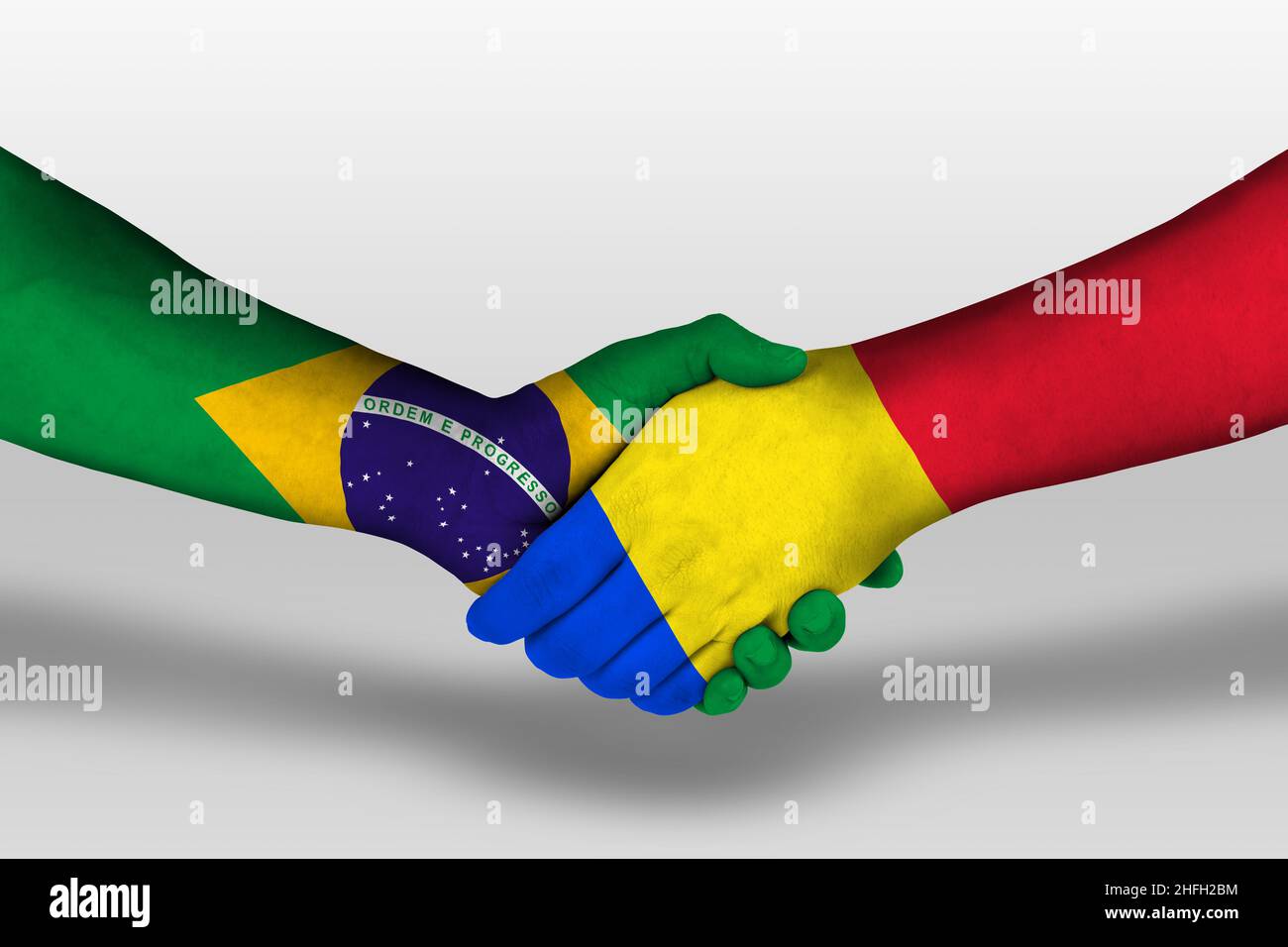 Handshake between romania and brazil flags painted on hands ...