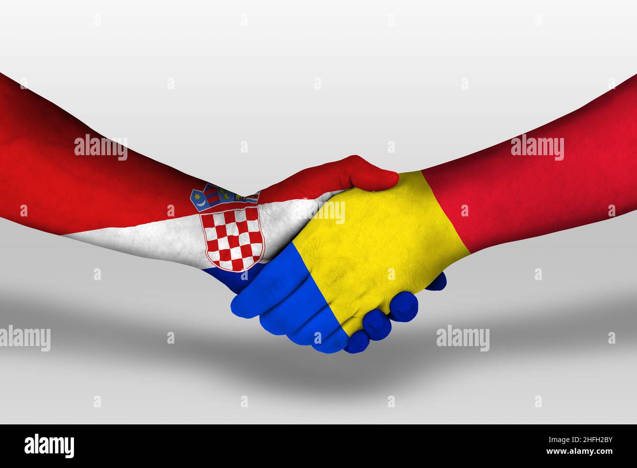 Handshake between romania and croatia flags painted on hands ...