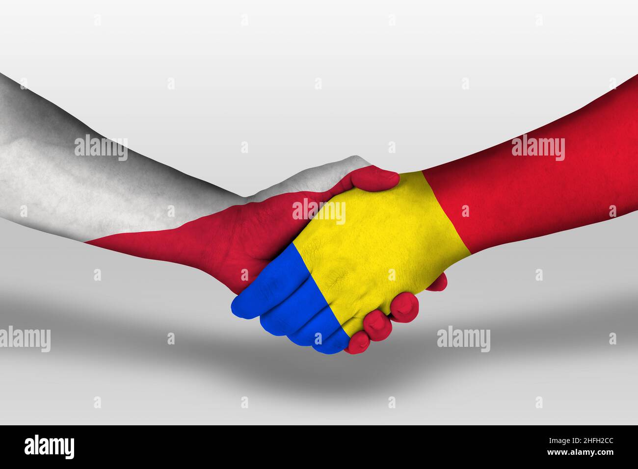 Handshake between romania and poland flags painted on hands ...