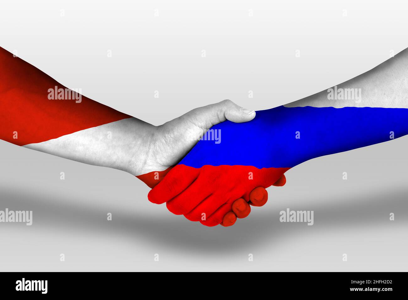 Handshake between russia and austria flags painted on hands ...