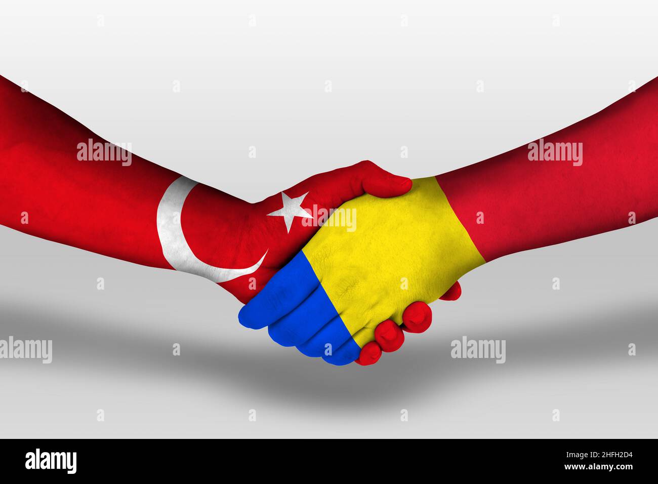 Handshake between romania and turkey flags painted on hands ...