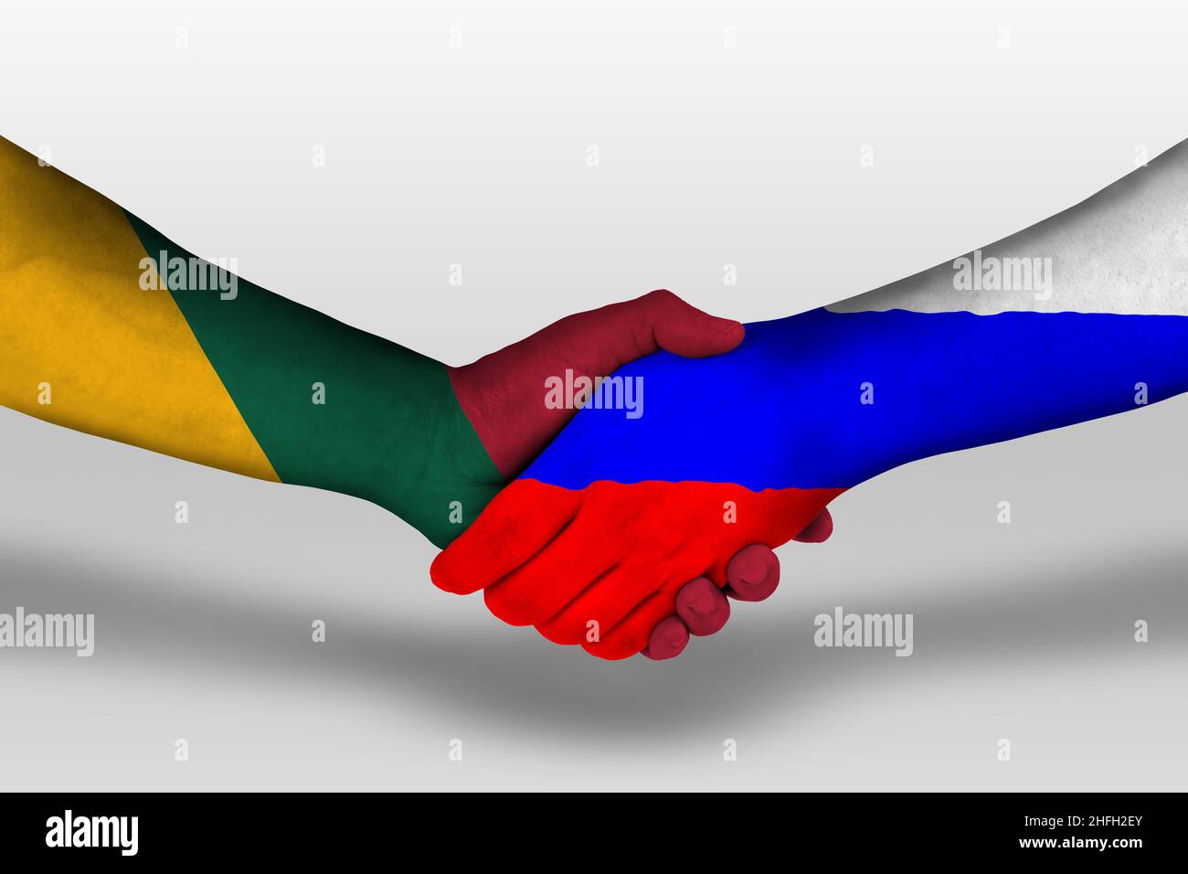 Handshake between russia and lithuania flags painted on hands ...