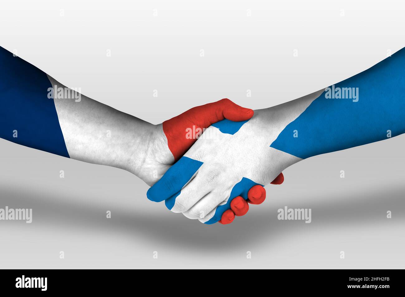 Handshake between scotland and france flags painted on hands ...
