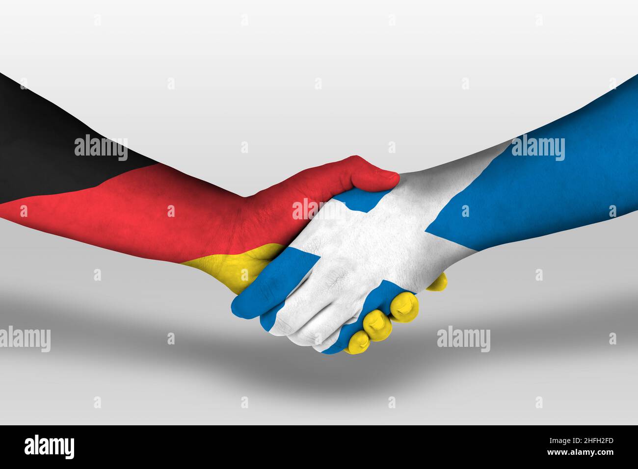 Handshake between scotland and germany flags painted on hands ...
