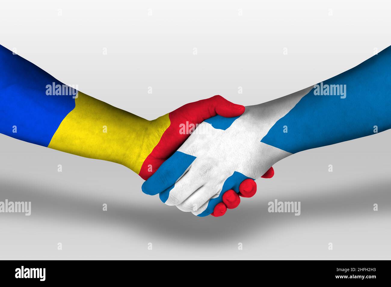 Handshake between scotland and romania flags painted on hands ...