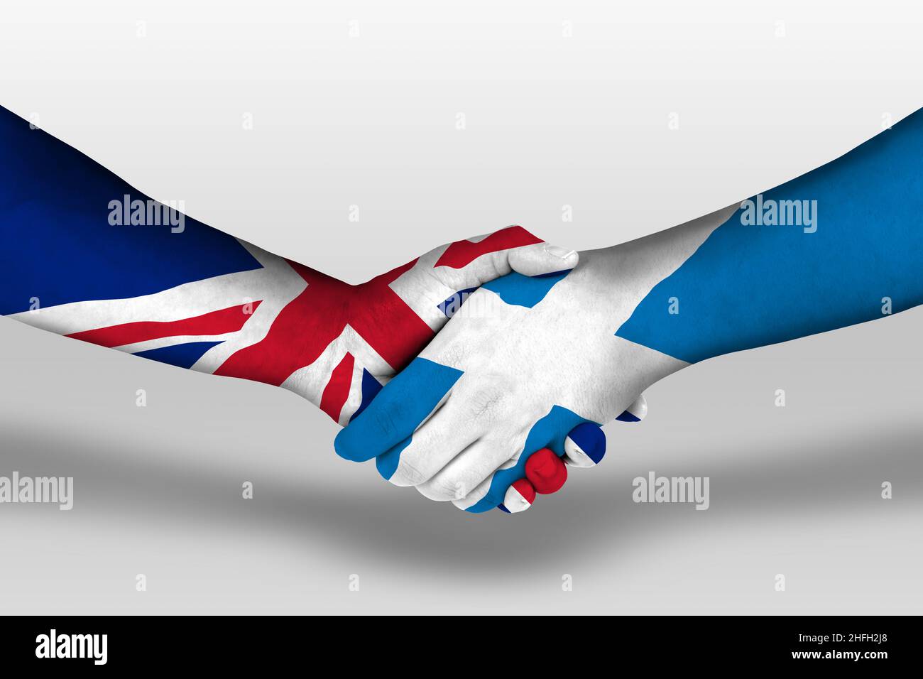 Handshake between scotland and united kingdom flags painted on hands ...