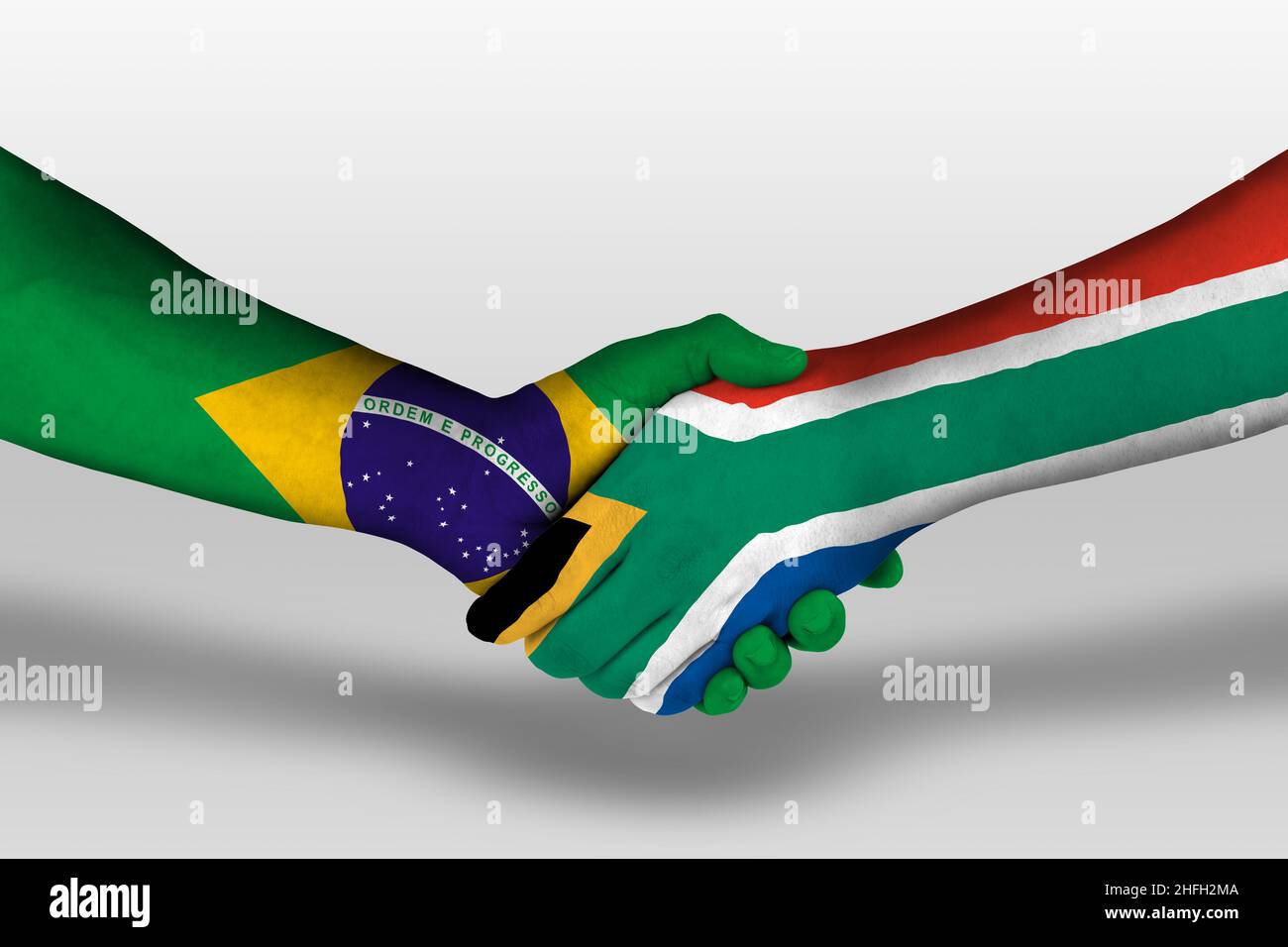 Handshake between south africa and brazil flags painted on hands ...
