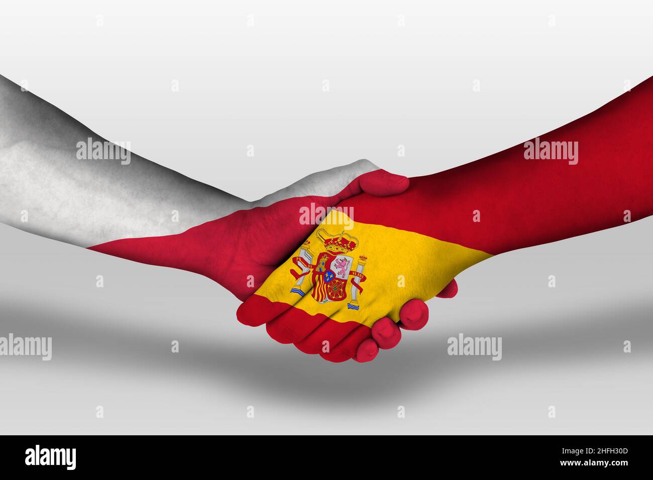 Handshake between spain and poland flags painted on hands, illustration ...