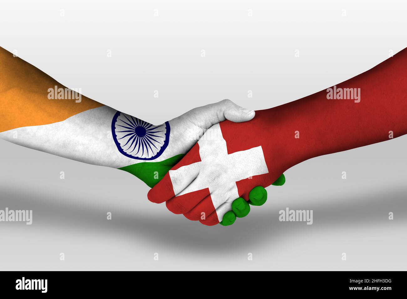 Handshake between switzerland and india flags painted on hands ...