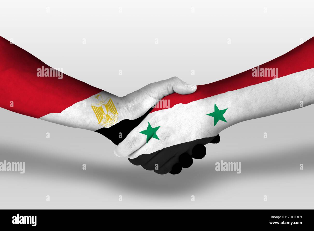 Handshake between syria and egypt flags painted on hands, illustration ...