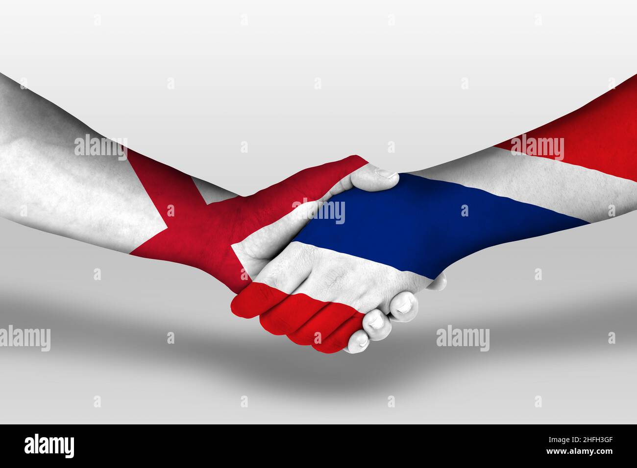 Handshake between thailand and england flags painted on hands ...
