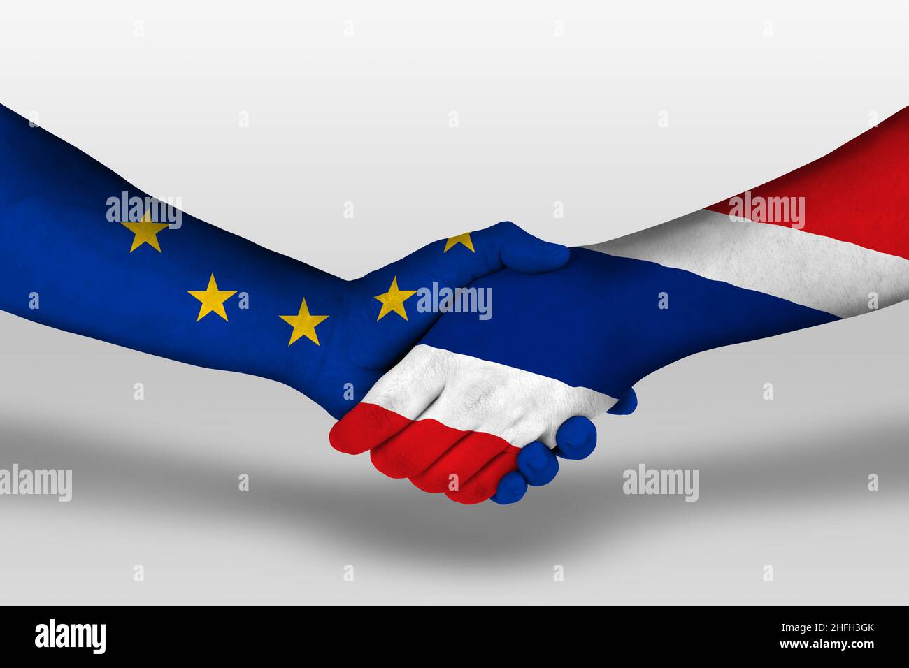 Handshake between thailand and european union flags painted on hands ...