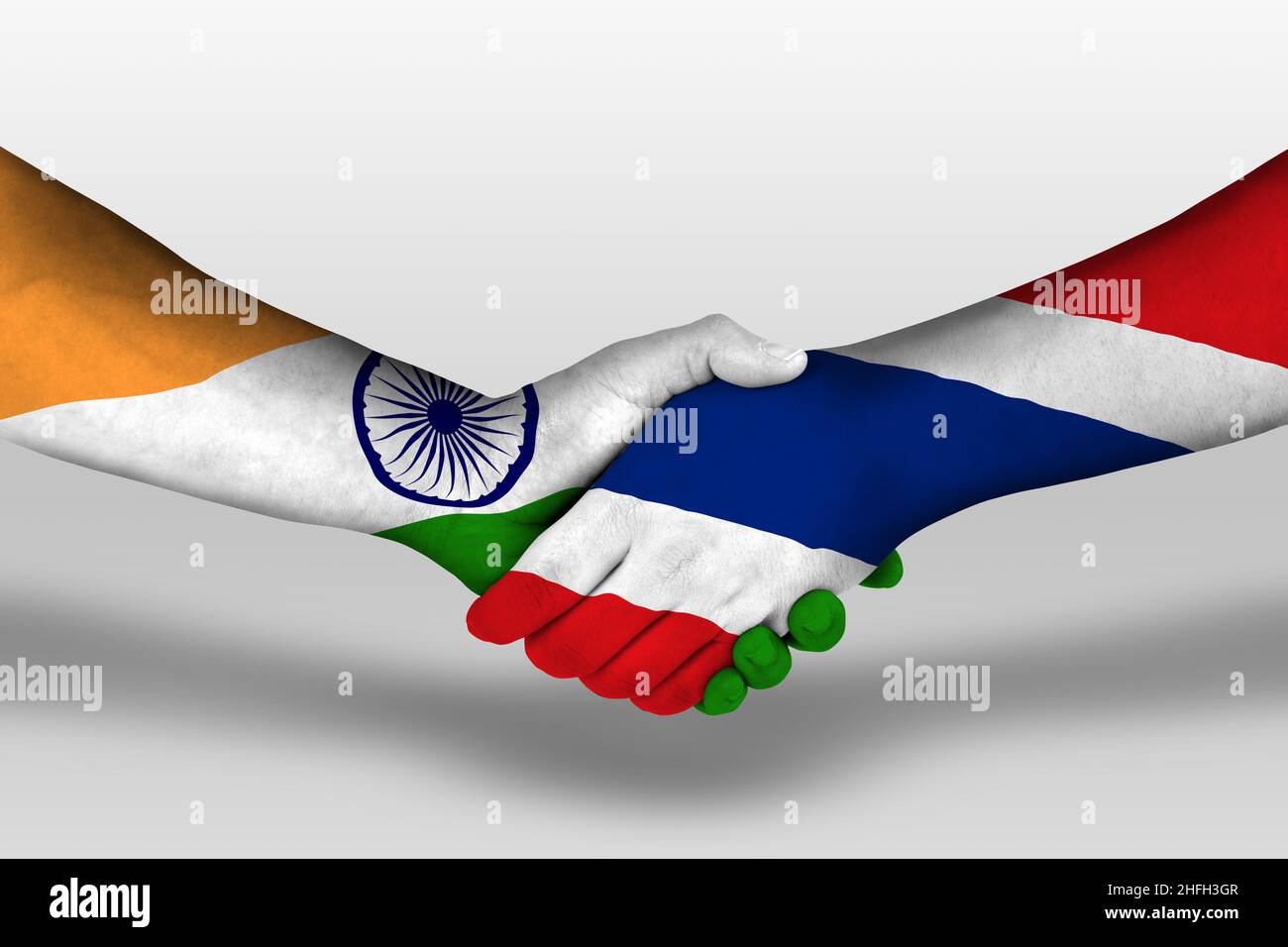 Handshake between thailand and india flags painted on hands ...