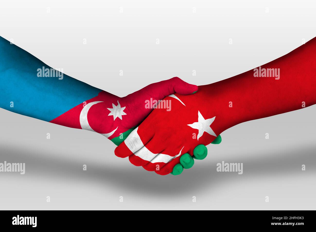Handshake between turkey and azerbaijan flags painted on hands ...