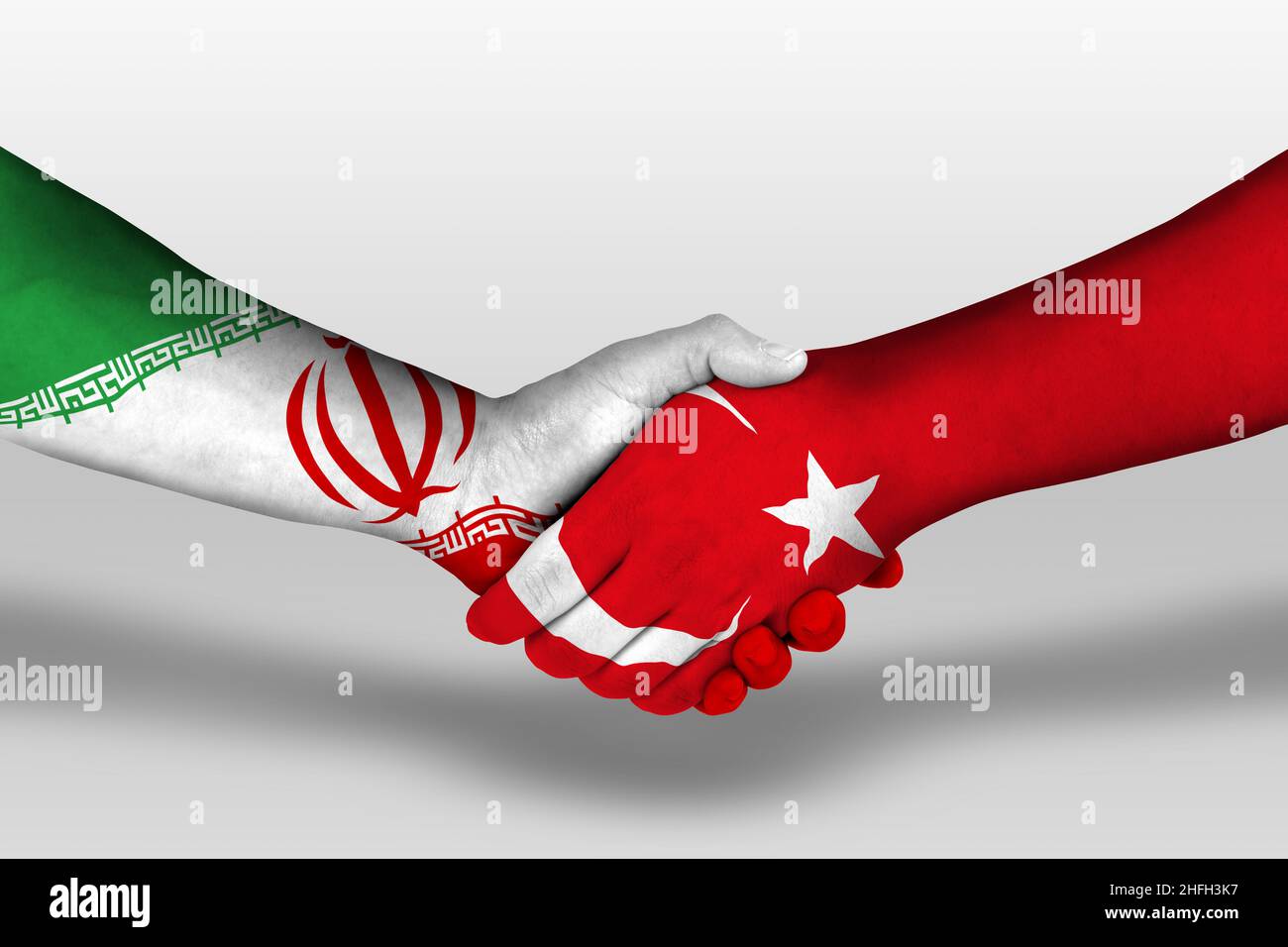 Handshake between turkey and iran flags painted on hands, illustration ...