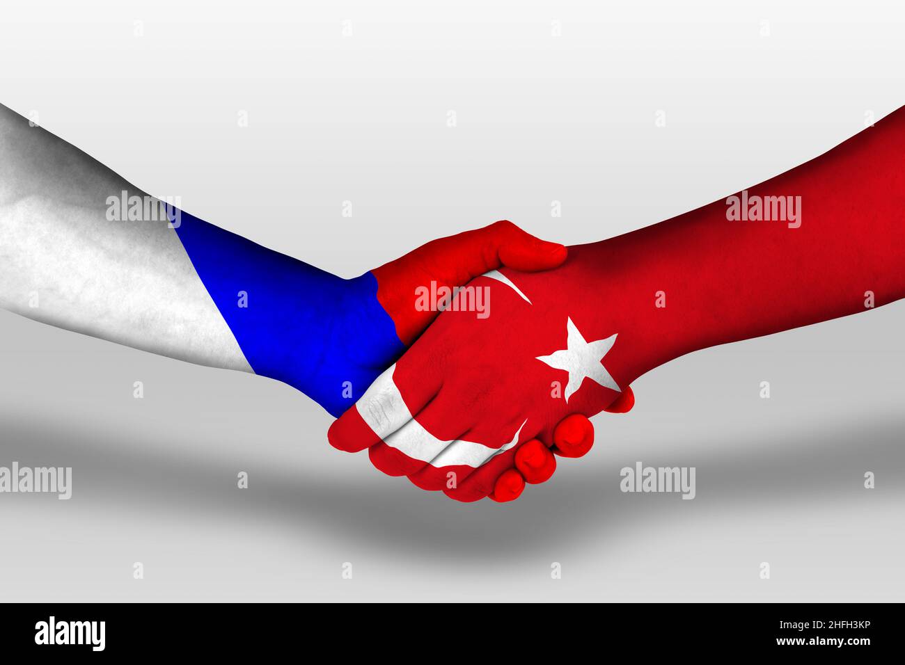 Handshake between turkey and russia flags painted on hands ...
