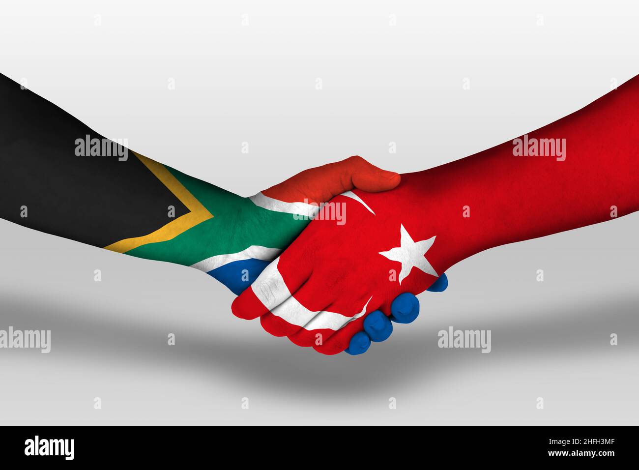 Handshake between turkey and south africa flags painted on hands ...