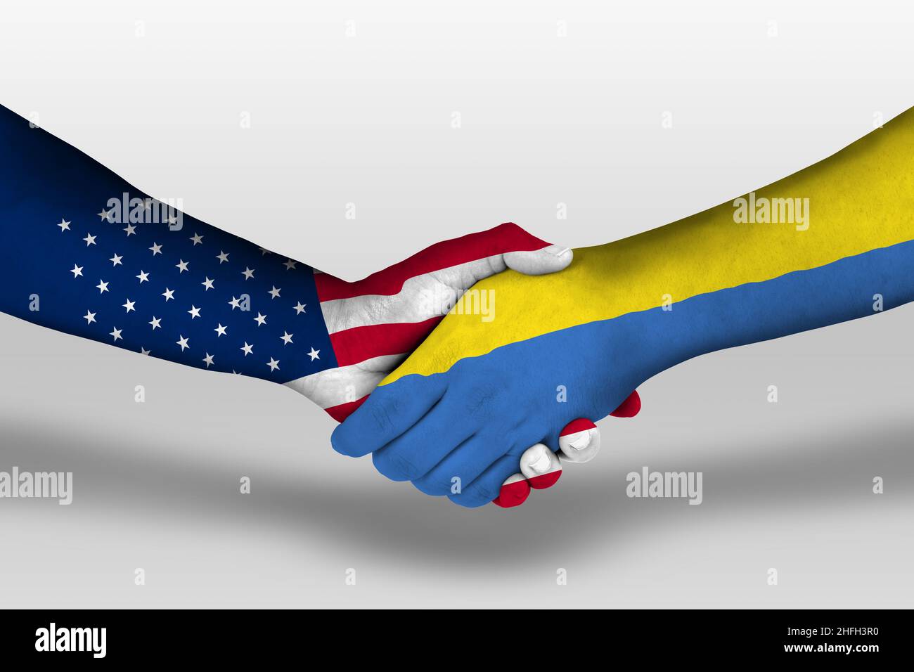 Handshake between ukraine and united states of america flags painted on ...