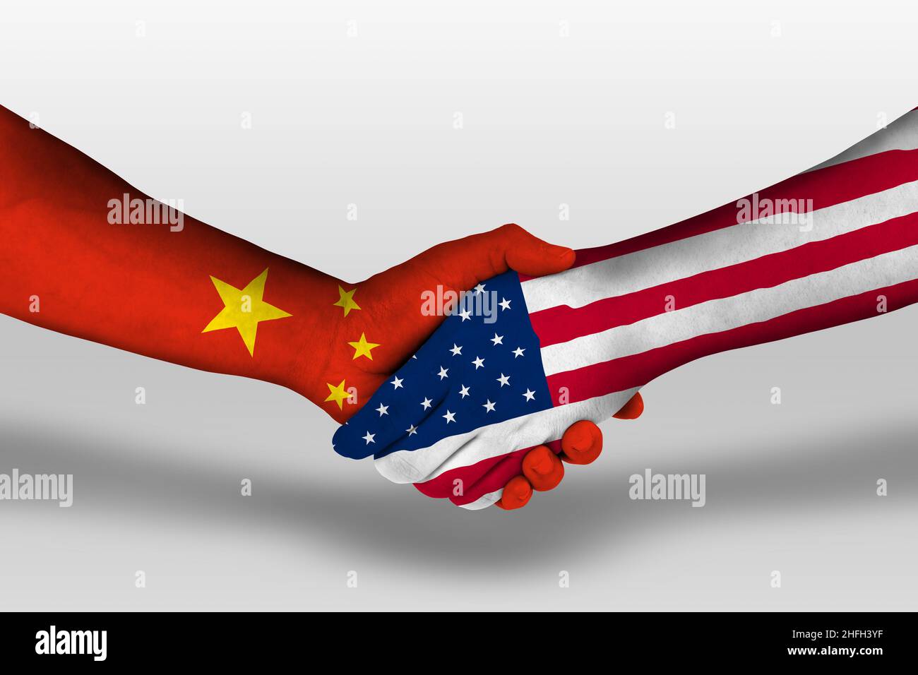 Handshake between united states of america and china flags painted on ...
